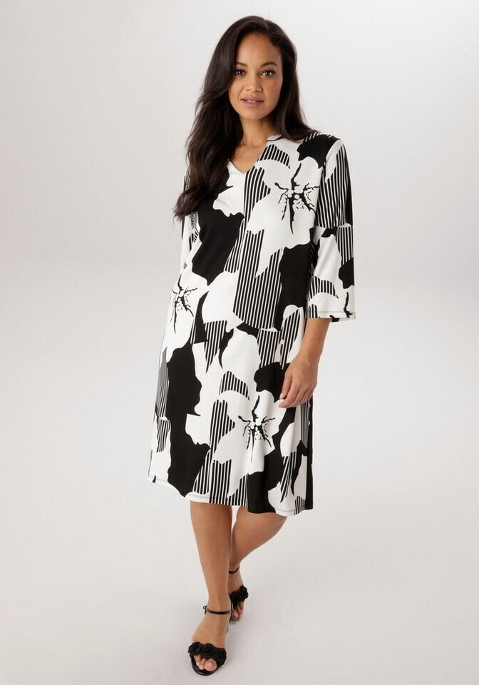 Spannende Kleid Mit Dreiviertelarm Bild